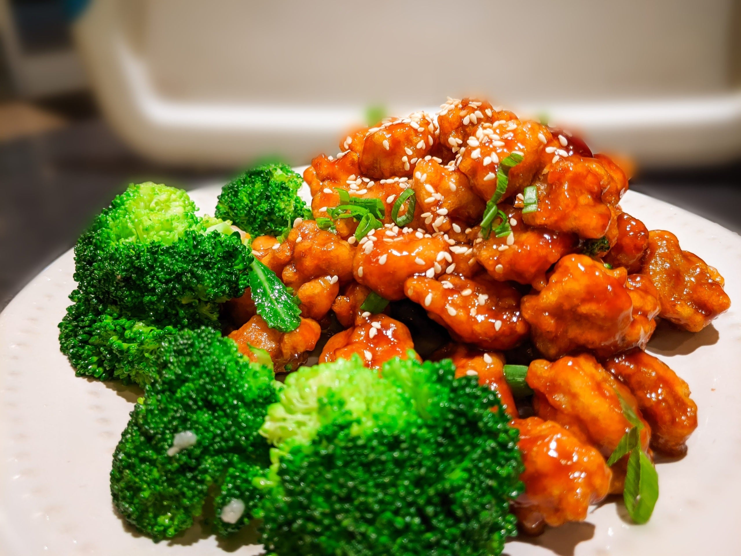 C28. Sesame Chicken (Combo) Egg roll | Lucky Wok Asian Cafe